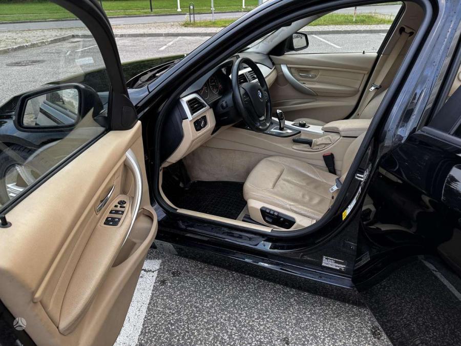 Black BMW 328 2013 in Vilnius, with an engine capacity of 2.00 L and mileage of 118 thousand km for 7600 €, photo 13 on AUTOMOTO.COM.LV