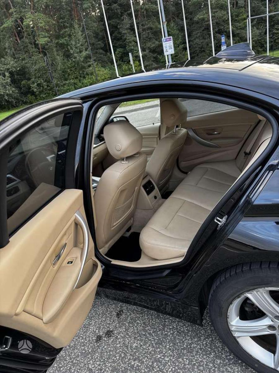 Black BMW 328 2013 in Vilnius, with an engine capacity of 2.00 L and mileage of 118 thousand km for 7600 €, photo 14 on AUTOMOTO.COM.LV