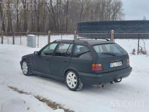 Black BMW 328 1992 in Kuldiga, with an engine capacity of 2.80 L and mileage of 277 thousand km for 2300 €, photo 3 on AUTOMOTO.COM.LV