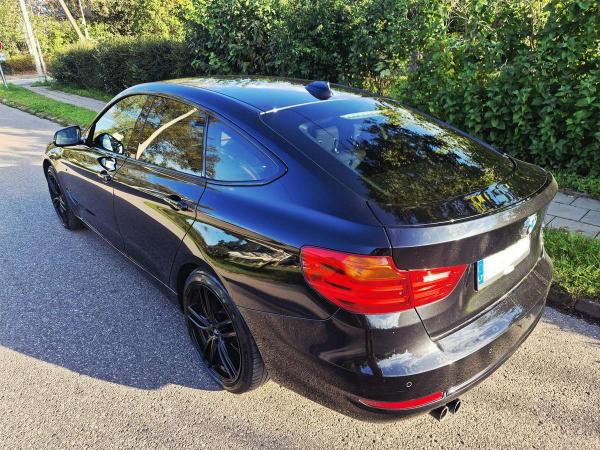 Black BMW 328 Gran Turismo 2014 in Vilnius, with an engine capacity of 2.00 L and mileage of 167 thousand km for 11900 €, photo 5 on AUTOMOTO.COM.LV