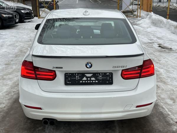 White BMW 328 2013 in Vilnius, with an engine capacity of 2.00 L and mileage of 222 thousand km for 9000 €, photo 4 on AUTOMOTO.COM.LV