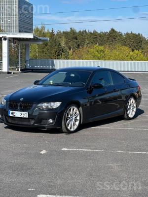 Black BMW 330 2009 in Riga, with an engine capacity of 3.00 L and mileage of 325 thousand km for 8900 €, photo 1 on AUTOMOTO.COM.LV