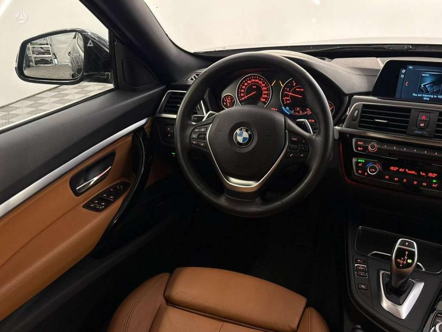 Black BMW 330 2018 in Marijampole, with an engine capacity of 2.99 L and mileage of 202 thousand km for 15999 €, photo 18 on AUTOMOTO.COM.LV