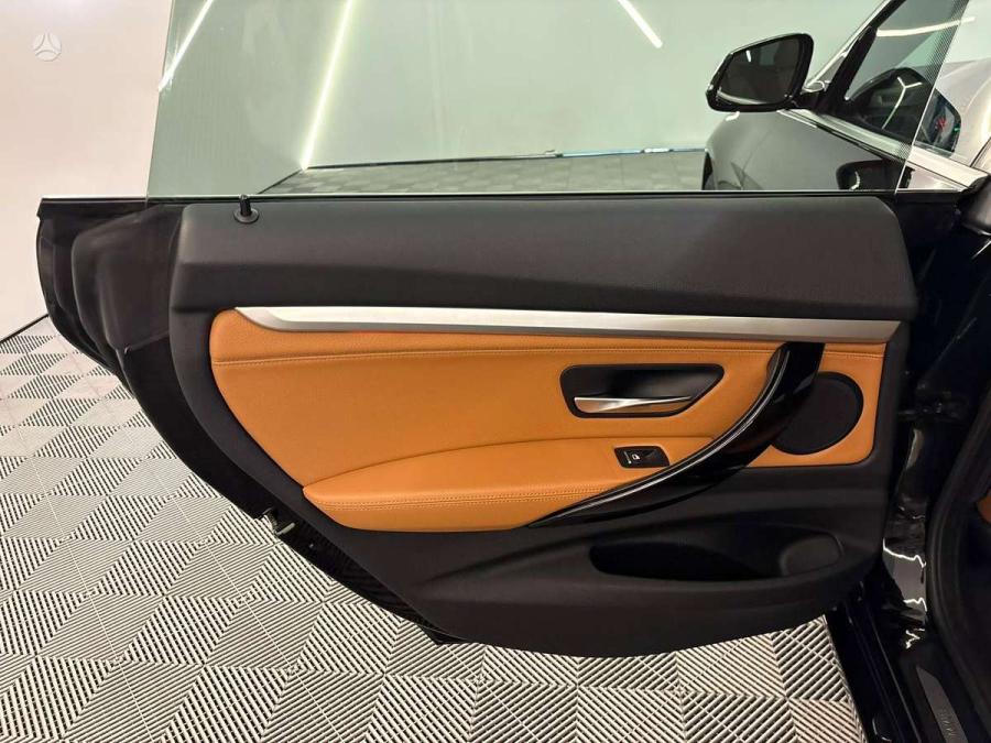 Black BMW 330 2018 in Marijampole, with an engine capacity of 2.99 L and mileage of 202 thousand km for 15999 €, photo 22 on AUTOMOTO.COM.LV