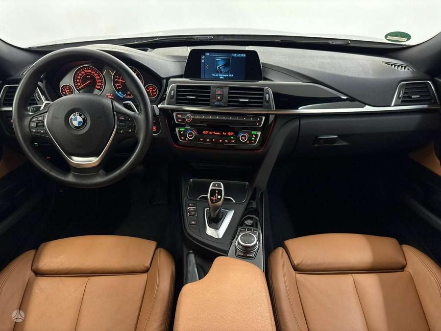 Black BMW 330 2018 in Marijampole, with an engine capacity of 2.99 L and mileage of 202 thousand km for 15999 €, photo 23 on AUTOMOTO.COM.LV