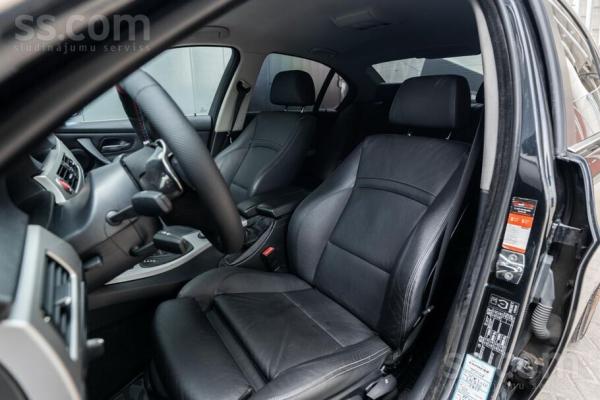 Black BMW 330 2005 in Riga, with an engine capacity of 3.00 L and mileage of 218 thousand km for 6400 €, photo 9 on AUTOMOTO.COM.LV