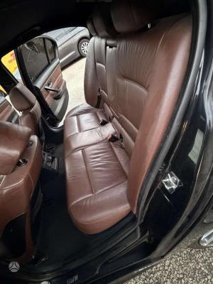 Black BMW 330 2006 in Vilnius, with an engine capacity of 2.99 L and mileage of 482 thousand km for 4300 €, photo 16 on AUTOMOTO.COM.LV