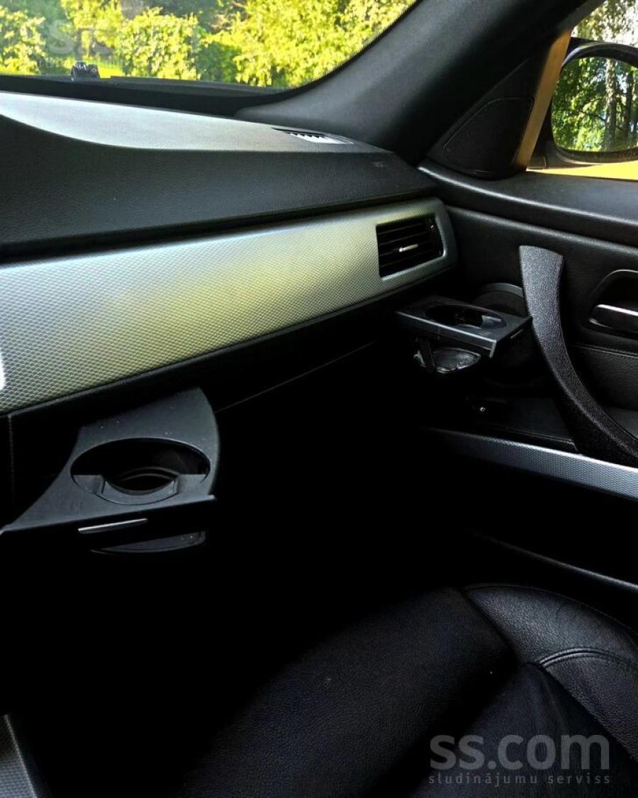 Black BMW 330 2008 in Riga, with an engine capacity of 3.00 L and mileage of 352 thousand km for 7700 €, photo 8 on AUTOMOTO.COM.LV