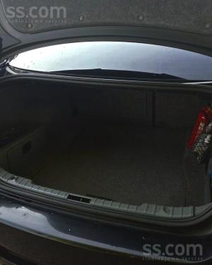 Black BMW 330 2008 in Riga, with an engine capacity of 3.00 L and mileage of 352 thousand km for 7700 €, photo 13 on AUTOMOTO.COM.LV