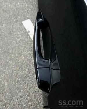 Black BMW 330 2008 in Riga, with an engine capacity of 3.00 L and mileage of 352 thousand km for 7700 €, photo 15 on AUTOMOTO.COM.LV