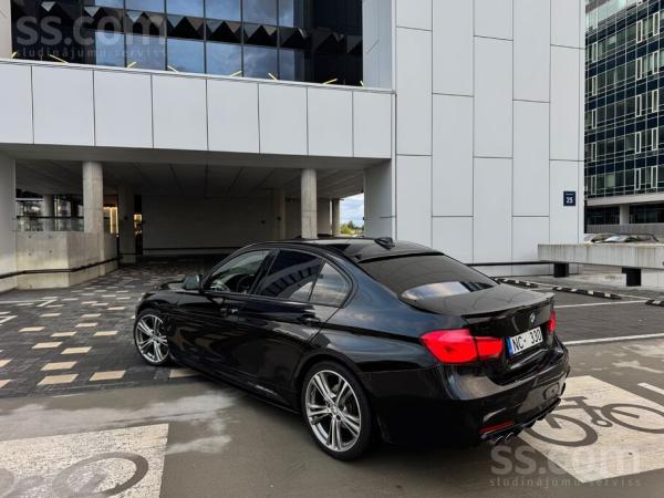 Black BMW 330 2012 in Riga, with an engine capacity of 2.00 L and mileage of 258 thousand km for 9800 €, photo 5 on AUTOMOTO.COM.LV