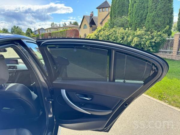 Black BMW 330 2012 in Riga, with an engine capacity of 2.00 L and mileage of 258 thousand km for 9800 €, photo 10 on AUTOMOTO.COM.LV