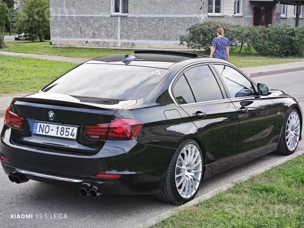 Black BMW 330 2013 in Daugavpils, with an engine capacity of 3.00 L and mileage of 216 thousand km for 14299 €, photo 3 on AUTOMOTO.COM.LV