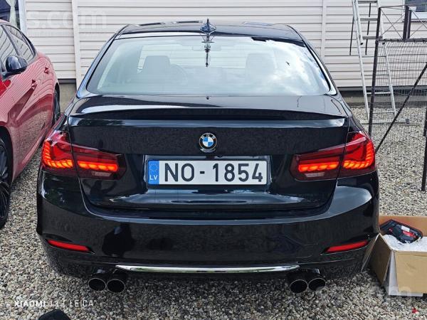 Black BMW 330 2013 in Daugavpils, with an engine capacity of 3.00 L and mileage of 216 thousand km for 14299 €, photo 6 on AUTOMOTO.COM.LV