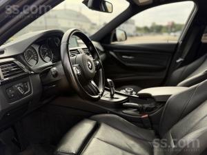 Black BMW 330 2013 in Riga, with an engine capacity of 3.00 L and mileage of 237 thousand km for 16600 €, photo 24 on AUTOMOTO.COM.LV