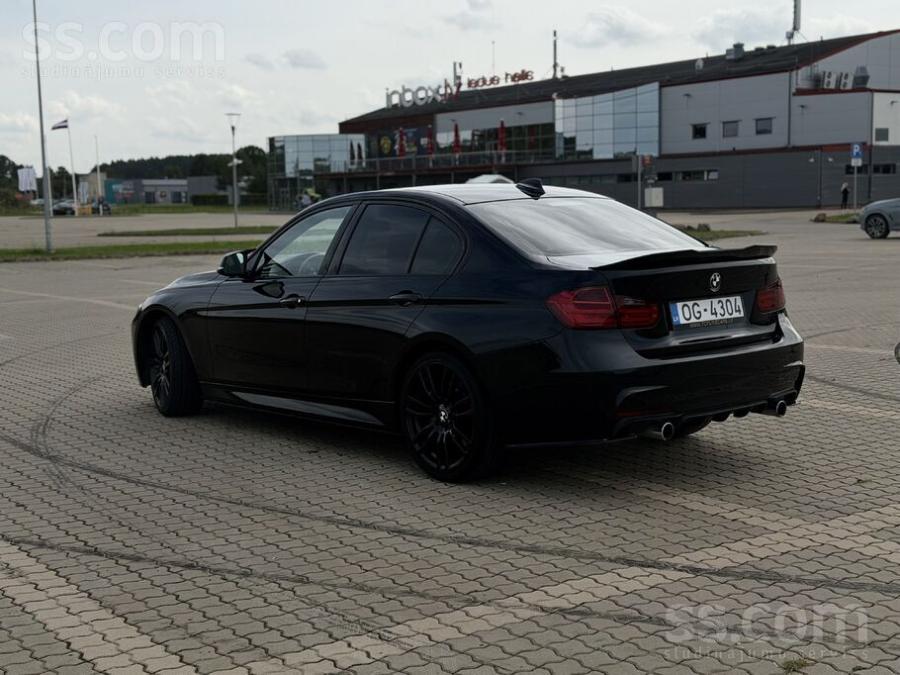 Black BMW 330 2013 in Riga, with an engine capacity of 3.00 L and mileage of 237 thousand km for 16600 €, photo 5 on AUTOMOTO.COM.LV
