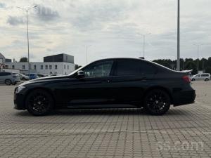 Black BMW 330 2013 in Riga, with an engine capacity of 3.00 L and mileage of 237 thousand km for 16600 €, photo 6 on AUTOMOTO.COM.LV