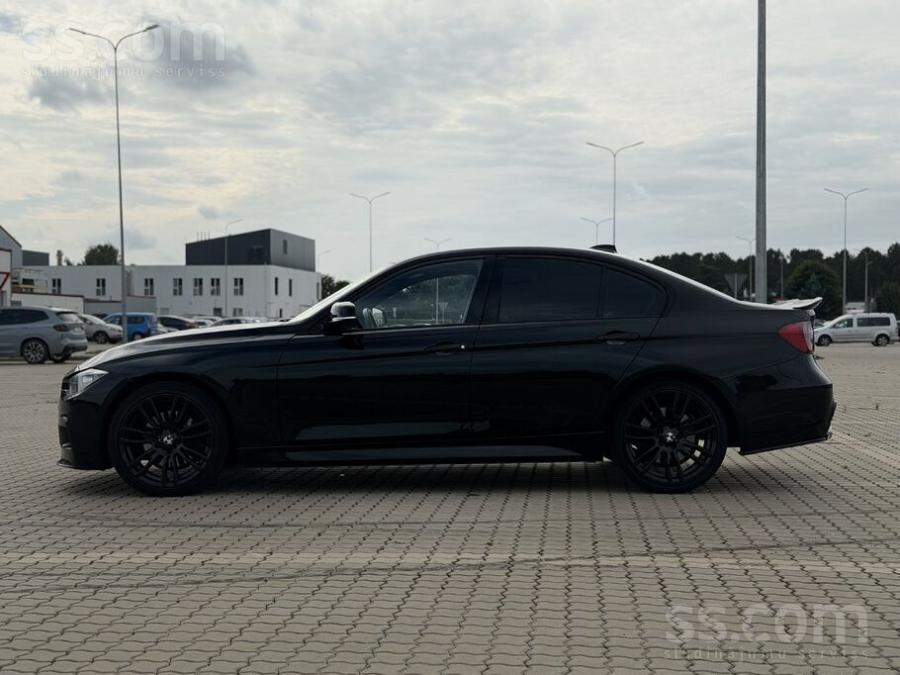 Black BMW 330 2013 in Riga, with an engine capacity of 3.00 L and mileage of 237 thousand km for 16600 €, photo 6 on AUTOMOTO.COM.LV