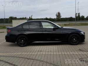 Black BMW 330 2013 in Riga, with an engine capacity of 3.00 L and mileage of 237 thousand km for 16600 €, photo 7 on AUTOMOTO.COM.LV