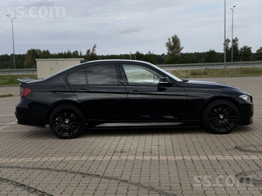 Black BMW 330 2013 in Riga, with an engine capacity of 3.00 L and mileage of 237 thousand km for 16600 €, photo 7 on AUTOMOTO.COM.LV