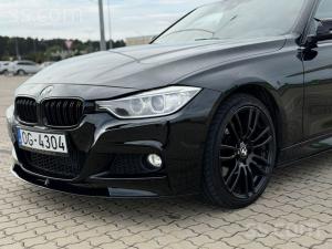 Black BMW 330 2013 in Riga, with an engine capacity of 3.00 L and mileage of 237 thousand km for 16600 €, photo 9 on AUTOMOTO.COM.LV