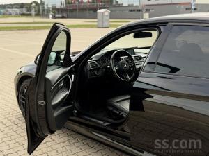 Black BMW 330 2013 in Riga, with an engine capacity of 3.00 L and mileage of 237 thousand km for 16600 €, photo 13 on AUTOMOTO.COM.LV
