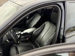 Black BMW 330 2013 in Riga, with an engine capacity of 3.00 L and mileage of 237 thousand km for 16600 €, photo 15 on AUTOMOTO.COM.LV