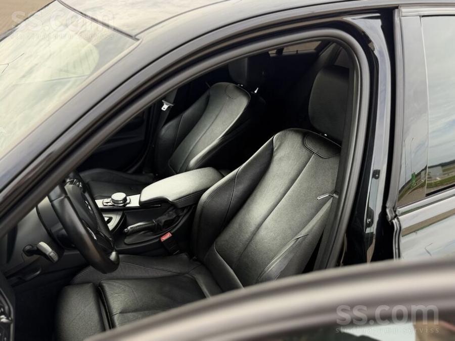 Black BMW 330 2013 in Riga, with an engine capacity of 3.00 L and mileage of 237 thousand km for 16600 €, photo 15 on AUTOMOTO.COM.LV