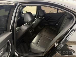 Black BMW 330 2013 in Riga, with an engine capacity of 3.00 L and mileage of 237 thousand km for 16600 €, photo 16 on AUTOMOTO.COM.LV