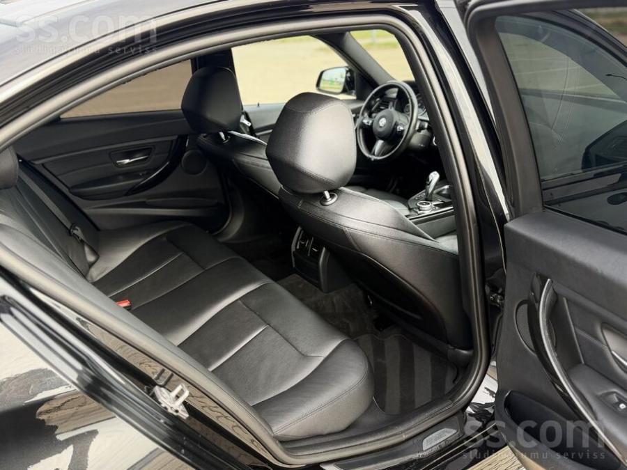 Black BMW 330 2013 in Riga, with an engine capacity of 3.00 L and mileage of 237 thousand km for 16600 €, photo 17 on AUTOMOTO.COM.LV