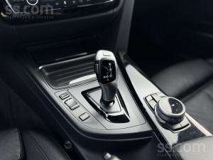 Black BMW 330 2013 in Riga, with an engine capacity of 3.00 L and mileage of 237 thousand km for 16600 €, photo 19 on AUTOMOTO.COM.LV
