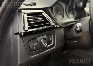 Black BMW 330 2013 in Riga, with an engine capacity of 3.00 L and mileage of 237 thousand km for 16600 €, photo 20 on AUTOMOTO.COM.LV