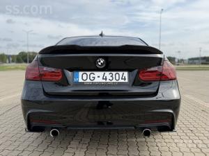 Black BMW 330 2013 in Riga, with an engine capacity of 3.00 L and mileage of 237 thousand km for 16600 €, photo 22 on AUTOMOTO.COM.LV