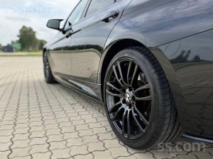 Black BMW 330 2013 in Riga, with an engine capacity of 3.00 L and mileage of 237 thousand km for 16600 €, photo 23 on AUTOMOTO.COM.LV