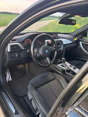 Black BMW 330 2016 in Riga, with an engine capacity of 2.00 L and mileage of 119 thousand km for 15899 €, photo 9 on AUTOMOTO.COM.LV