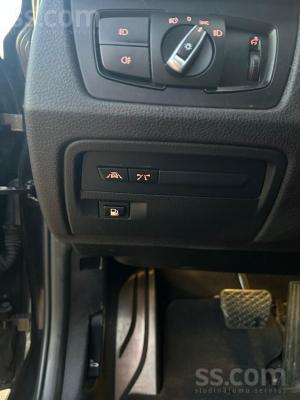 Black BMW 330 2016 in Riga, with an engine capacity of 2.00 L and mileage of 119 thousand km for 15899 €, photo 10 on AUTOMOTO.COM.LV