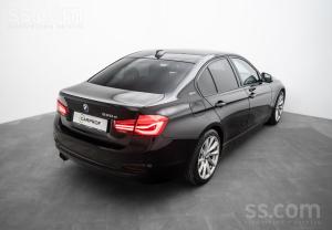 Black BMW 330 2017 in Riga, with an engine capacity of 2.00 L and mileage of 15 thousand km for 14999 €, photo 5 on AUTOMOTO.COM.LV