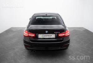 Black BMW 330 2017 in Riga, with an engine capacity of 2.00 L and mileage of 15 thousand km for 14999 €, photo 6 on AUTOMOTO.COM.LV