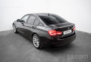 Black BMW 330 2017 in Riga, with an engine capacity of 2.00 L and mileage of 15 thousand km for 14999 €, photo 7 on AUTOMOTO.COM.LV