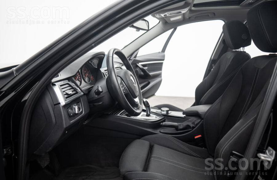 Black BMW 330 2017 in Riga, with an engine capacity of 2.00 L and mileage of 15 thousand km for 14999 €, photo 8 on AUTOMOTO.COM.LV