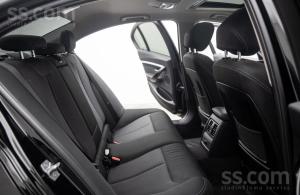 Black BMW 330 2017 in Riga, with an engine capacity of 2.00 L and mileage of 15 thousand km for 14999 €, photo 10 on AUTOMOTO.COM.LV