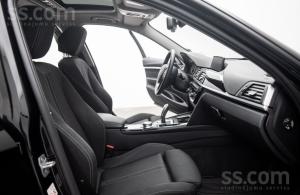 Black BMW 330 2017 in Riga, with an engine capacity of 2.00 L and mileage of 15 thousand km for 14999 €, photo 11 on AUTOMOTO.COM.LV
