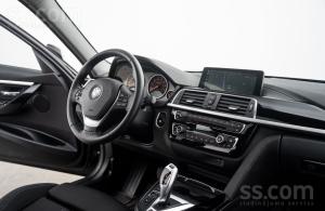 Black BMW 330 2017 in Riga, with an engine capacity of 2.00 L and mileage of 15 thousand km for 14999 €, photo 12 on AUTOMOTO.COM.LV