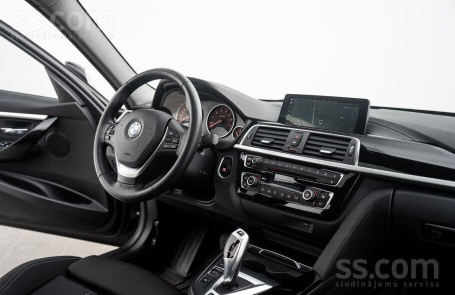 Black BMW 330 2017 in Riga, with an engine capacity of 2.00 L and mileage of 15 thousand km for 14999 €, photo 12 on AUTOMOTO.COM.LV
