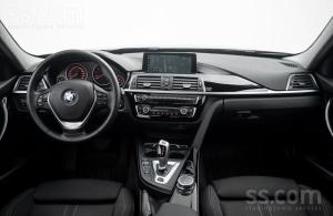 Black BMW 330 2017 in Riga, with an engine capacity of 2.00 L and mileage of 15 thousand km for 14999 €, photo 13 on AUTOMOTO.COM.LV