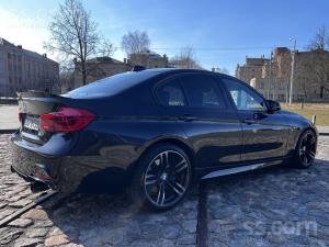 Black BMW 330 2017 in Riga, with an engine capacity of 3.00 L and mileage of 293 thousand km for 15900 €, photo 6 on AUTOMOTO.COM.LV