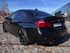 Black BMW 330 2017 in Riga, with an engine capacity of 3.00 L and mileage of 293 thousand km for 15900 €, photo 8 on AUTOMOTO.COM.LV