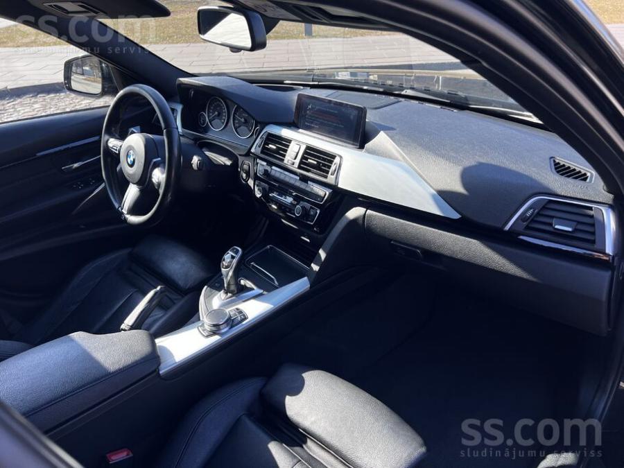 Black BMW 330 2017 in Riga, with an engine capacity of 3.00 L and mileage of 293 thousand km for 15900 €, photo 9 on AUTOMOTO.COM.LV