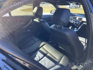 Black BMW 330 2017 in Riga, with an engine capacity of 3.00 L and mileage of 293 thousand km for 15900 €, photo 10 on AUTOMOTO.COM.LV