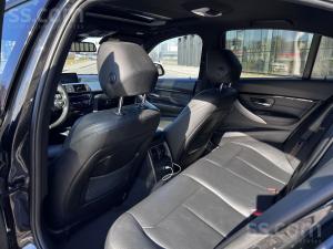 Black BMW 330 2017 in Riga, with an engine capacity of 3.00 L and mileage of 293 thousand km for 15900 €, photo 11 on AUTOMOTO.COM.LV